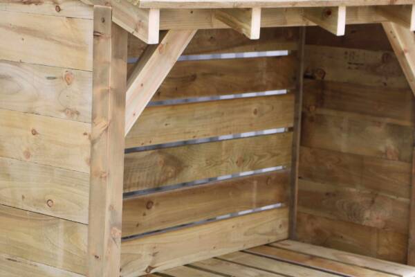 Wooden Log Store With Roof And Raised Floor
